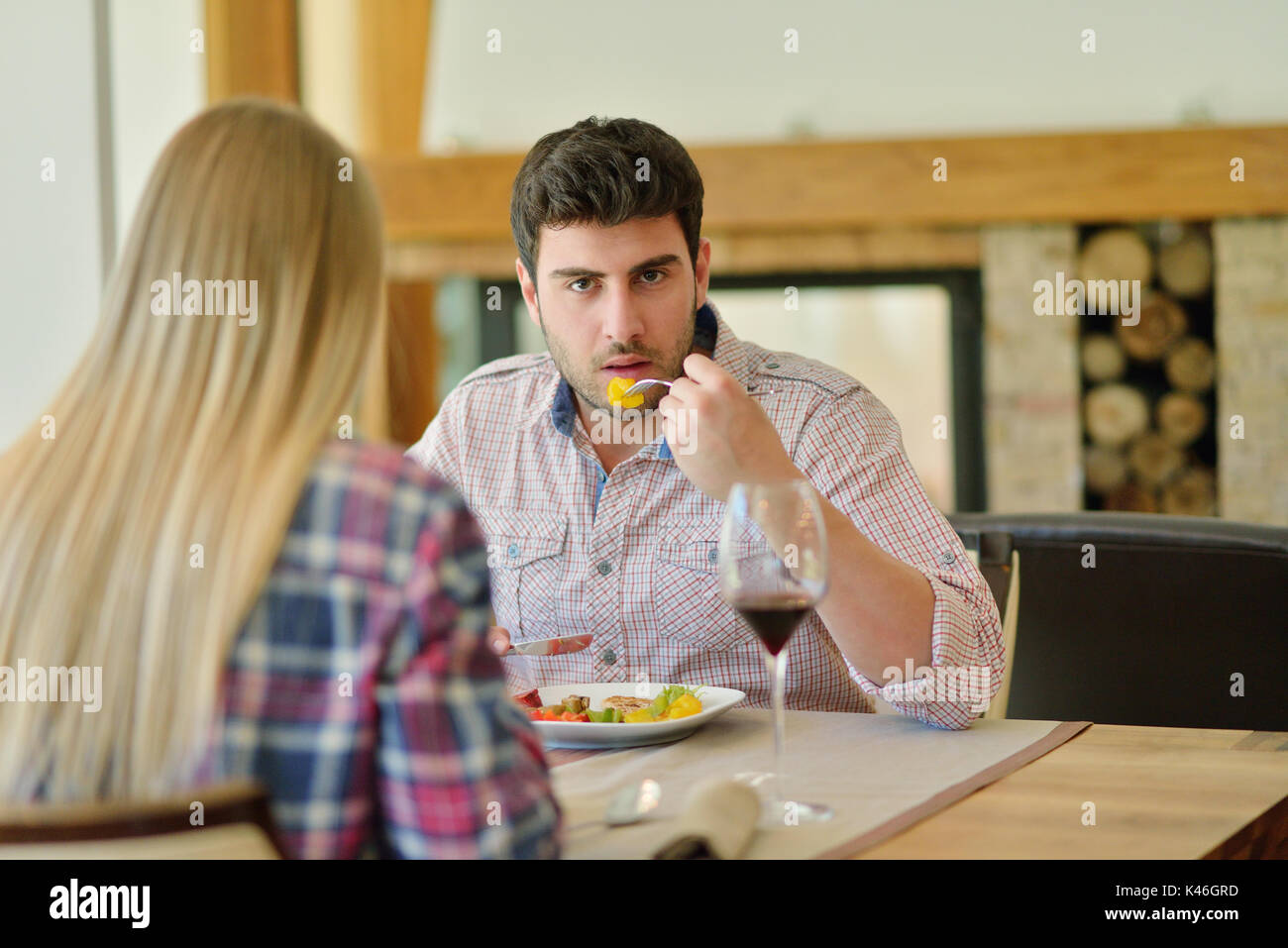 romantic lunch in a fancy restaurant.couple sitting and eating at lunch ...