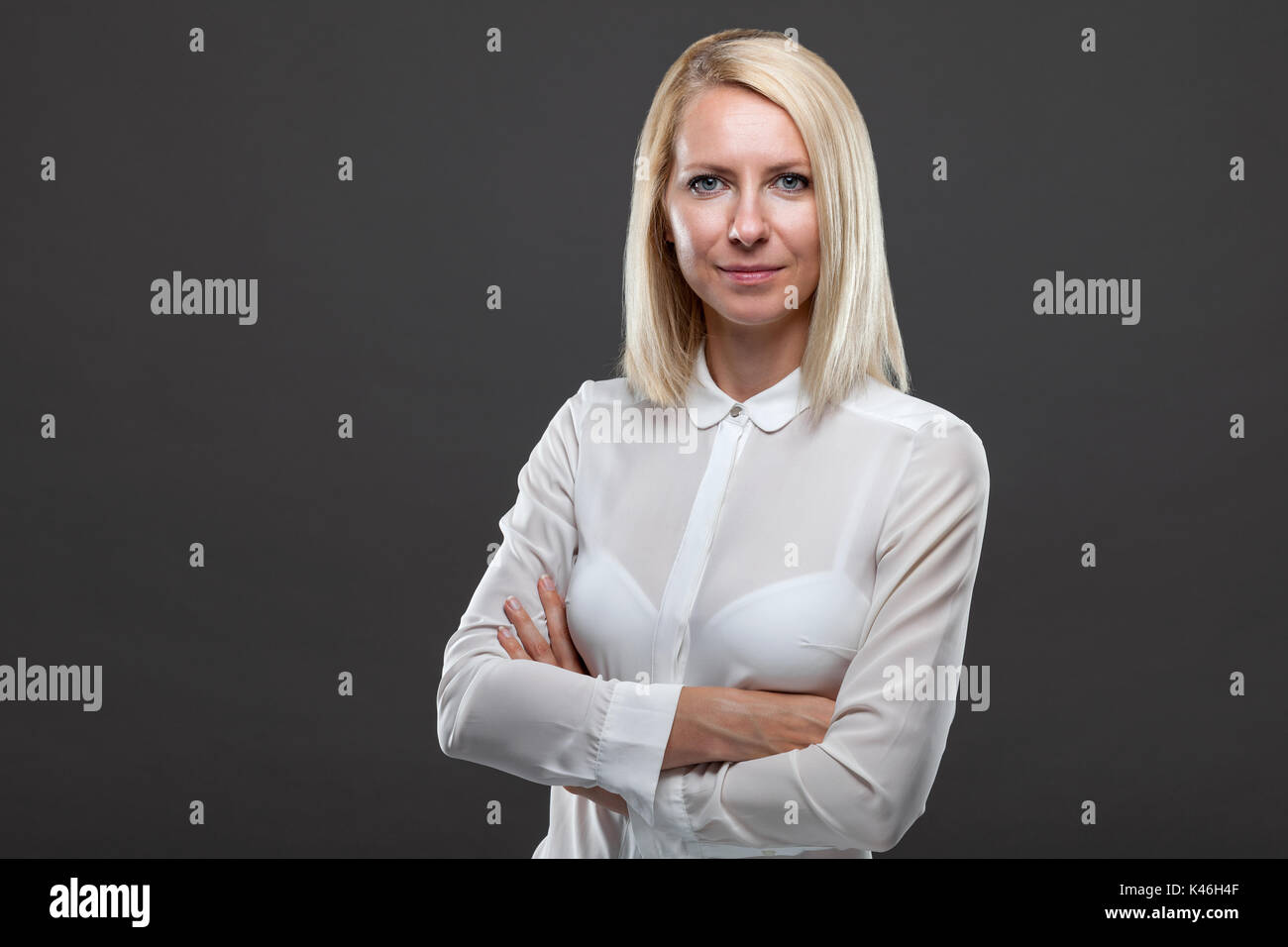 Young business woman, studio shoot Stock Photo - Alamy