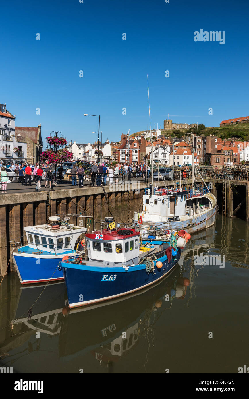Fishing cobles in Whitby inner harbour Stock Photo - Alamy