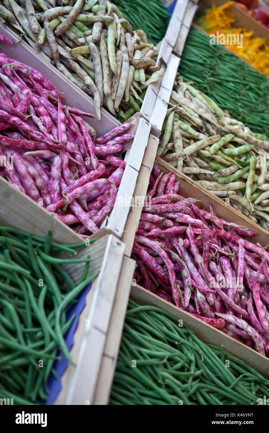 Various beans in crates on a market stall Stock Photo - Alamy