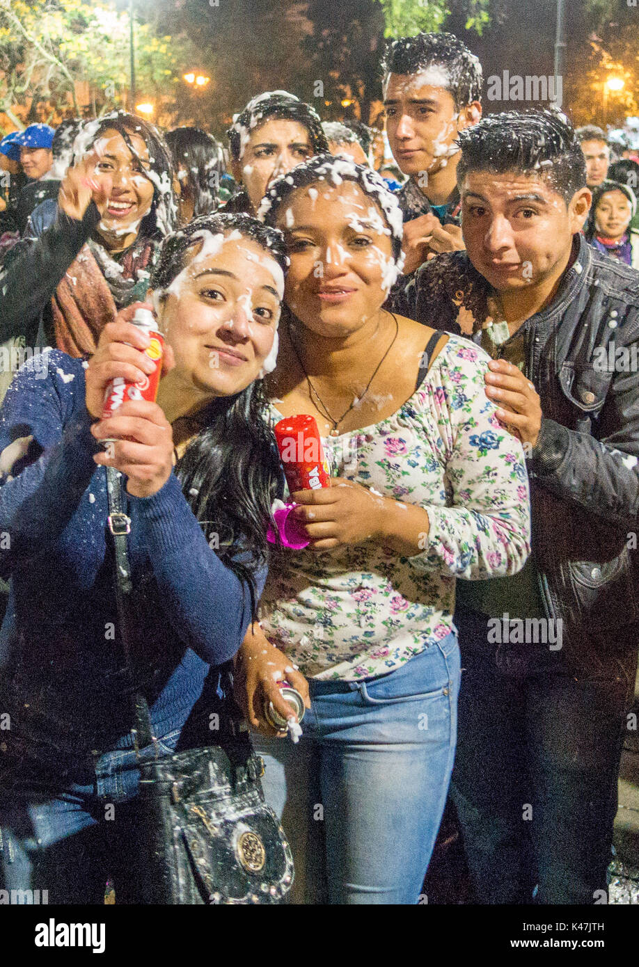 Cuenca, Ecuador - Feb 4, 2016: Foam is sprayed on everyone in annual ...