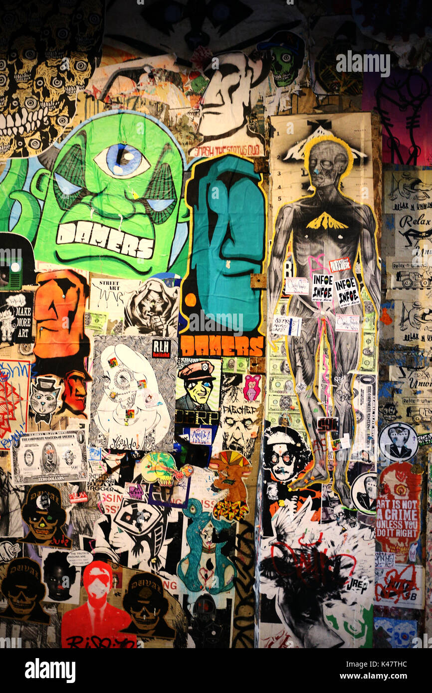 SEATTLE, WA, USA - JUNE 2016 - Wall decorated with stickers, posters ...