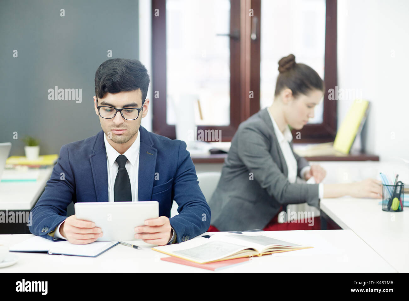Managers at work Stock Photo - Alamy