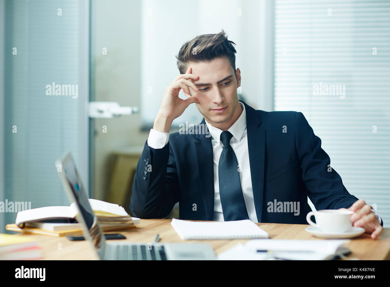Having break at workplace Stock Photo - Alamy