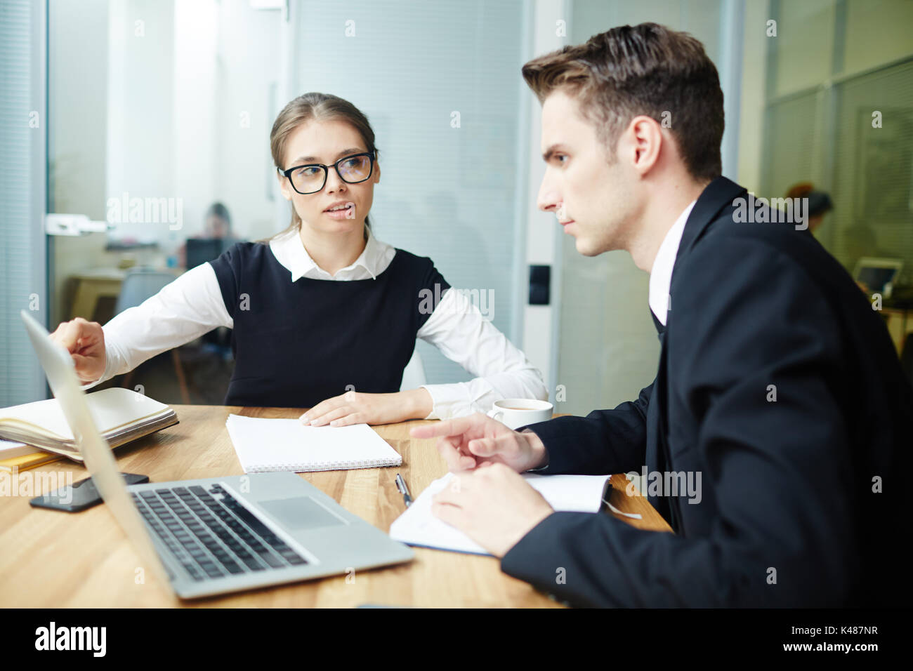 Pointing at display Stock Photo - Alamy