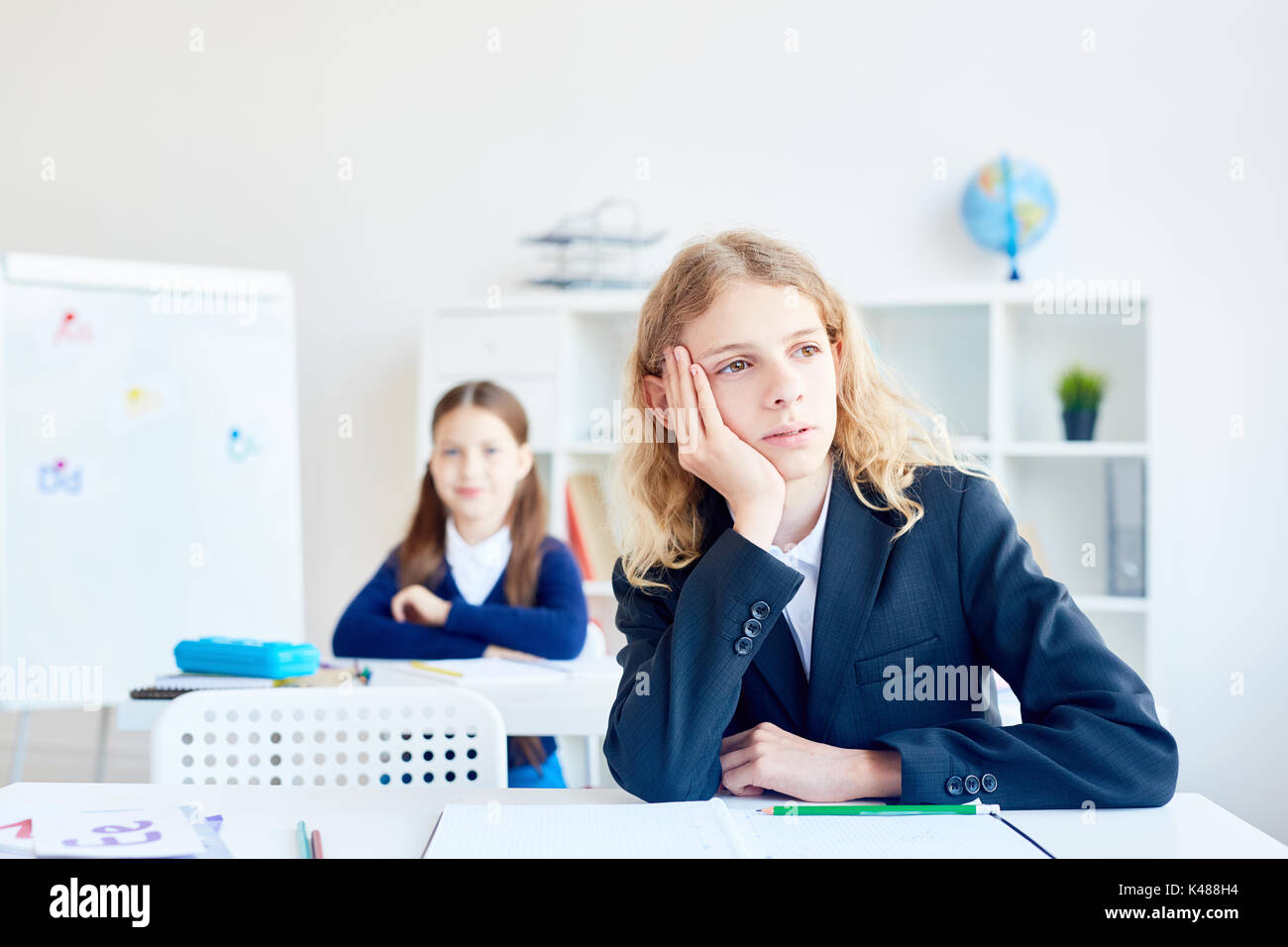 Child daydreaming classroom hi-res stock photography and images - Alamy