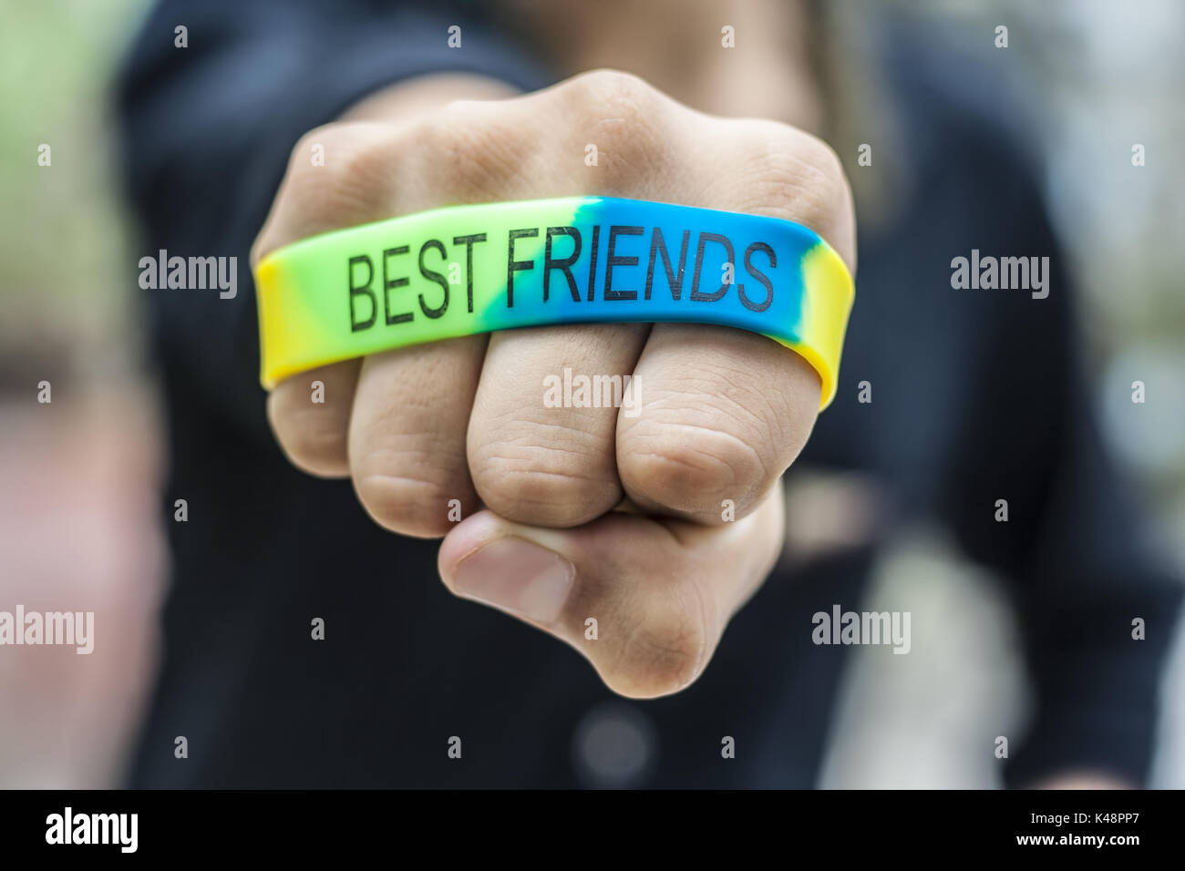 A hand showing friendship band Stock Photo - Alamy