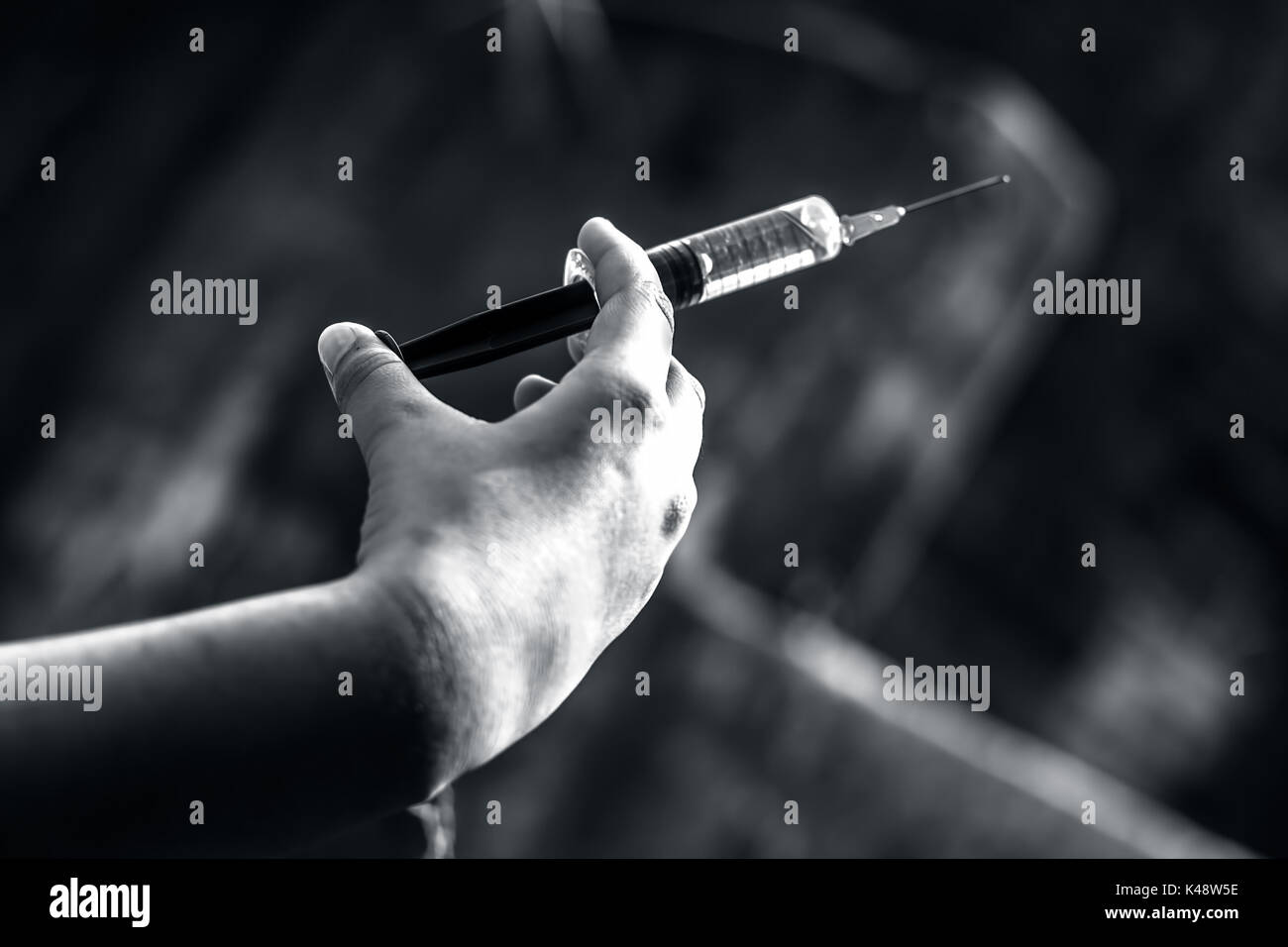 A hand holding antibiotic injection Stock Photo - Alamy