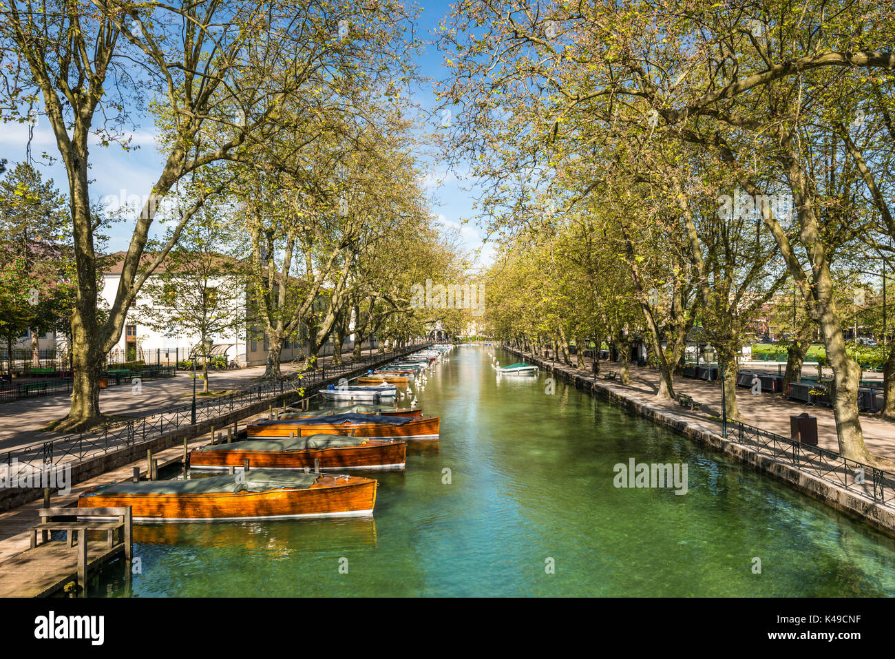 View of river and boat from Pont des Amours (Bridge of Love) in Annecy ...