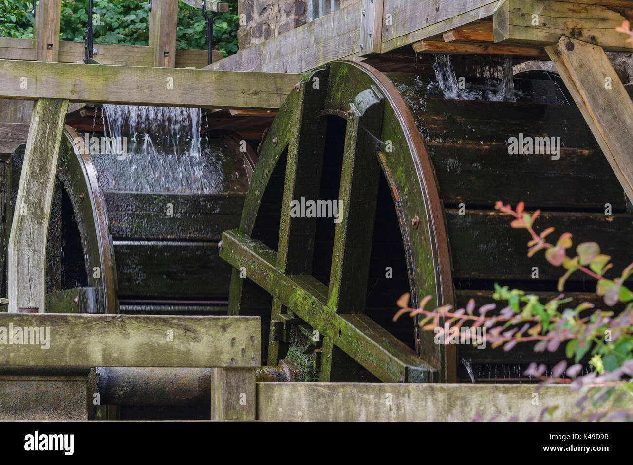 Reconstituted and restored mill wheel of an old water mill in Germany ...