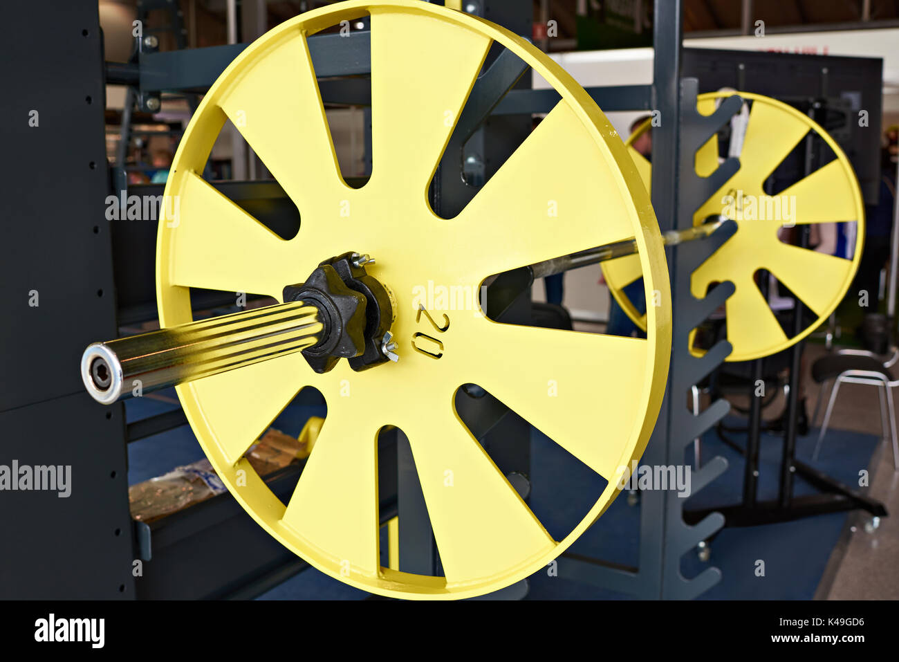 Barbell on a rack in a sports gym Stock Photo - Alamy