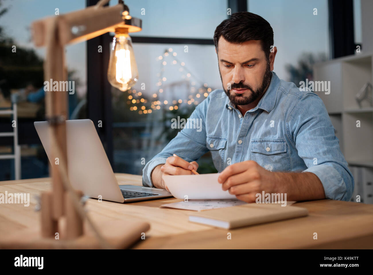 Smart handsome businessman reading a document Stock Photo - Alamy Smart handsome businessman reading a document Stock Photo - Alamy