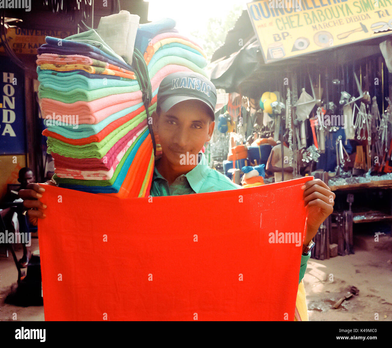 Salesman at street market in Bamako, Mali Stock Photo - Alamy