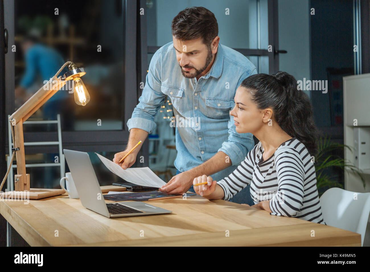 Ambitious startup team working together hi-res stock photography and ...