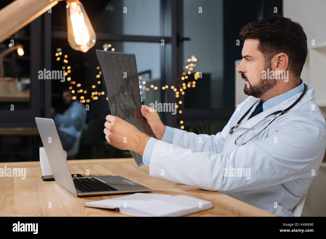 Smart experienced doctor putting a diagnosis Stock Photo - Alamy