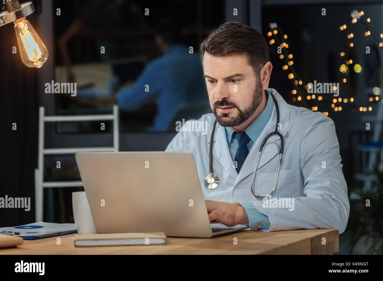 Professional male scientist typing on the laptop keyboard Stock Photo ...