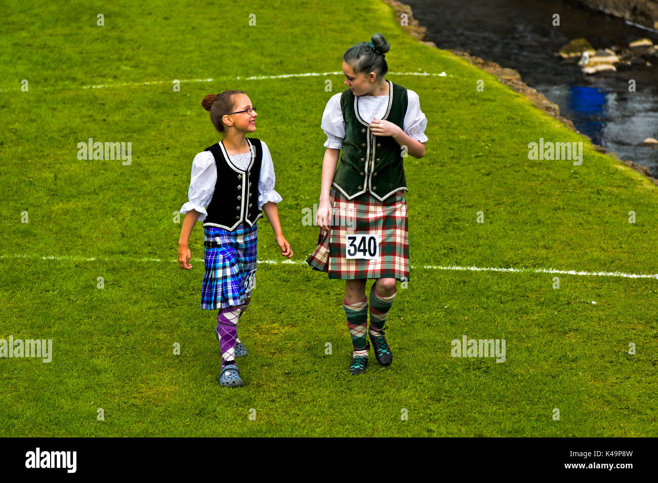 Two Girls In National Dress On The Way To The Folk Dance Competition ...