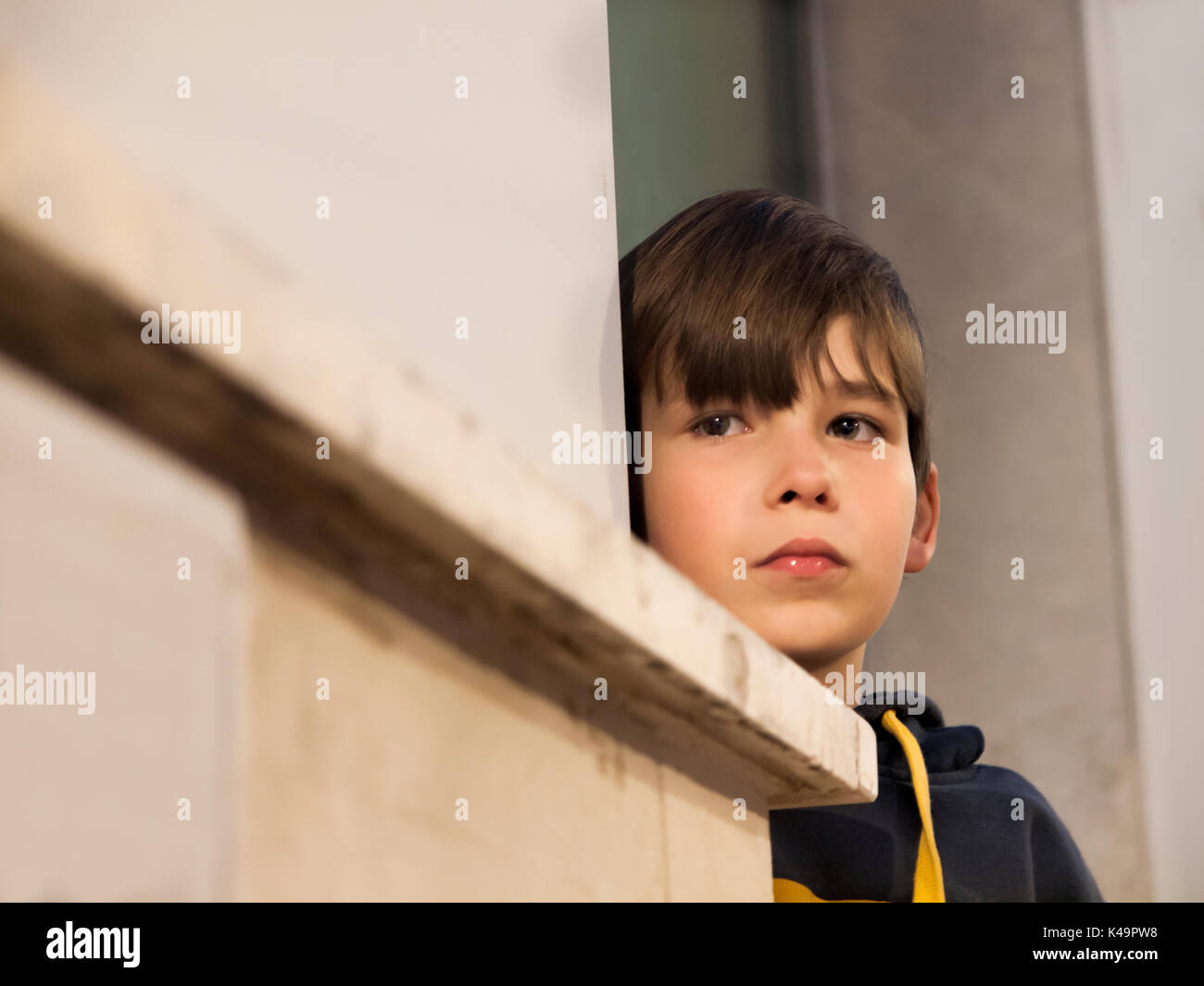 Outdoorportrait Of A Boy Child With Urban Background Stock Photo - Alamy