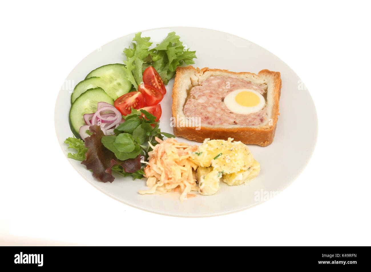 Gala pie and salad on a plate isolated against white Stock Photo - Alamy