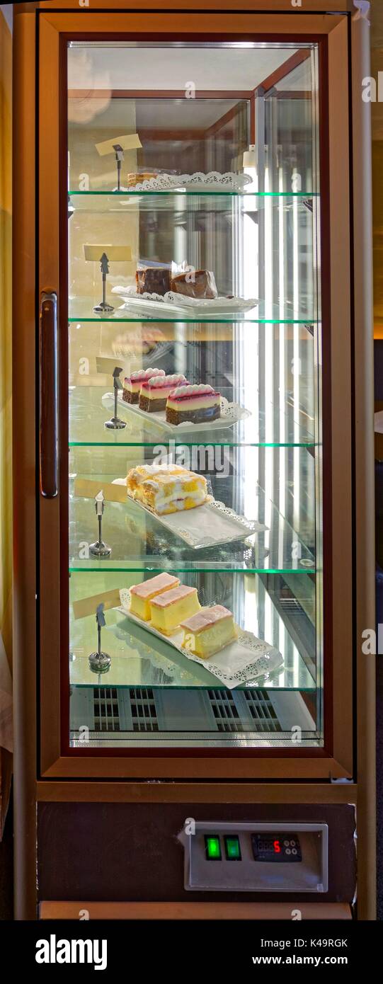Cake Cabinet With Cakes, Illuminated Stock Photo - Alamy