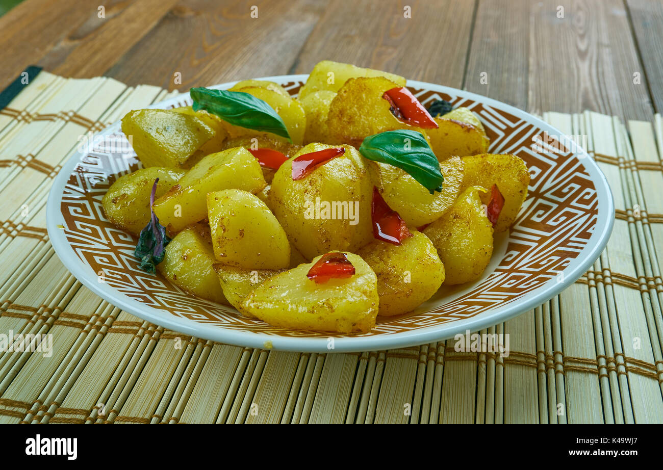 Aloo jerra - Indian dish of sauteed boiled potatoes with cumin and ...