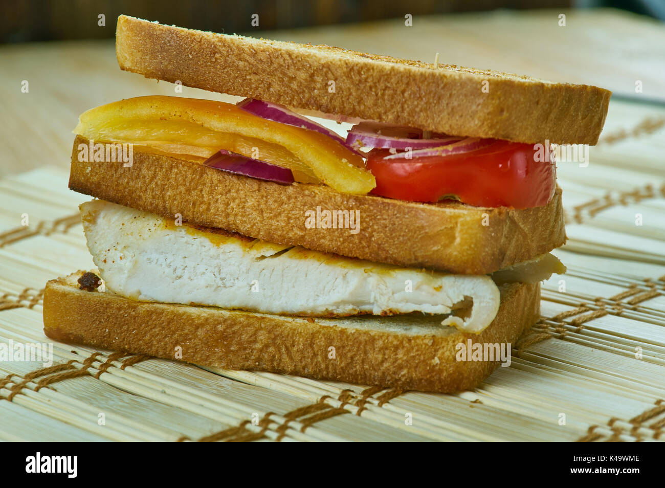 Smoked Paprika Fried Chicken Club Sandwich. close up meal Stock Photo ...
