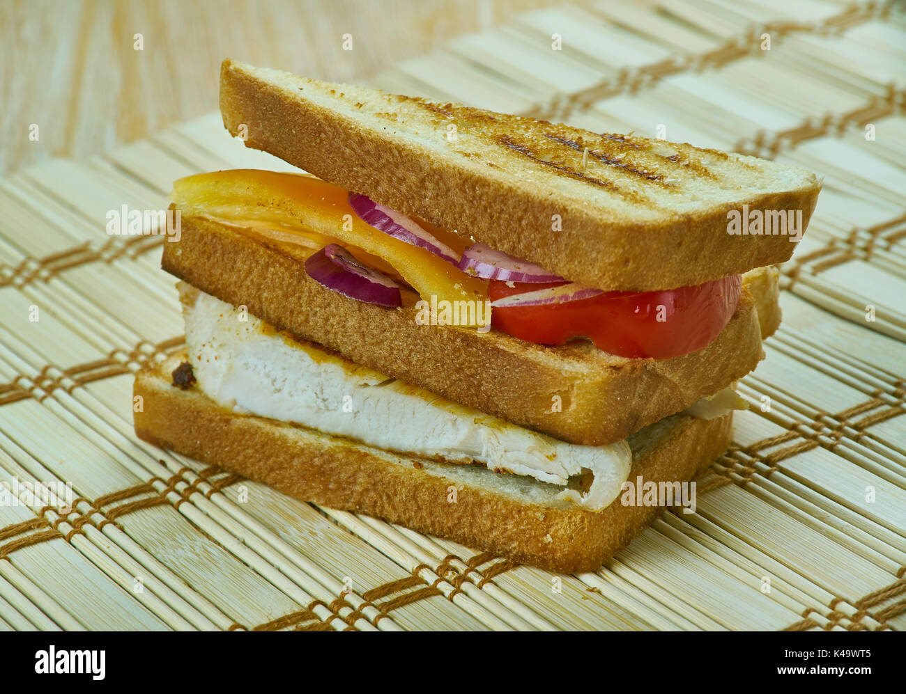 Smoked Paprika Fried Chicken Club Sandwich. close up meal Stock Photo ...