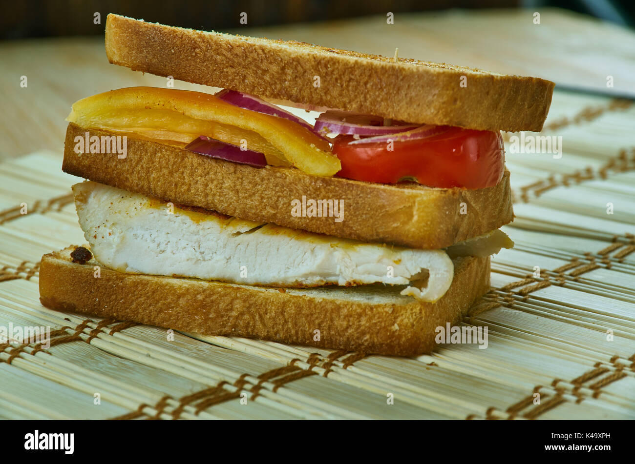 Smoked Paprika Fried Chicken Club Sandwich. close up meal Stock Photo ...