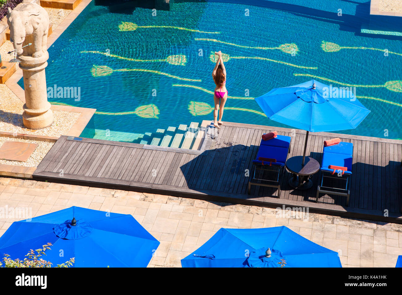 Woman relaxing in infinity hi-res stock photography and images - Alamy