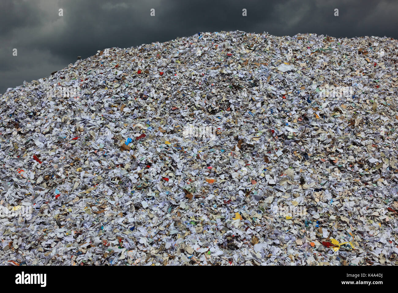 Waste paper, shredded waste paper in a recycling company, paper flakes ...