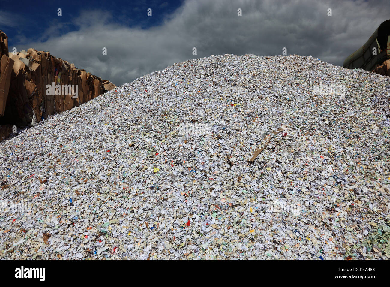 Waste paper, shredded waste paper in a recycling company, paper flakes ...