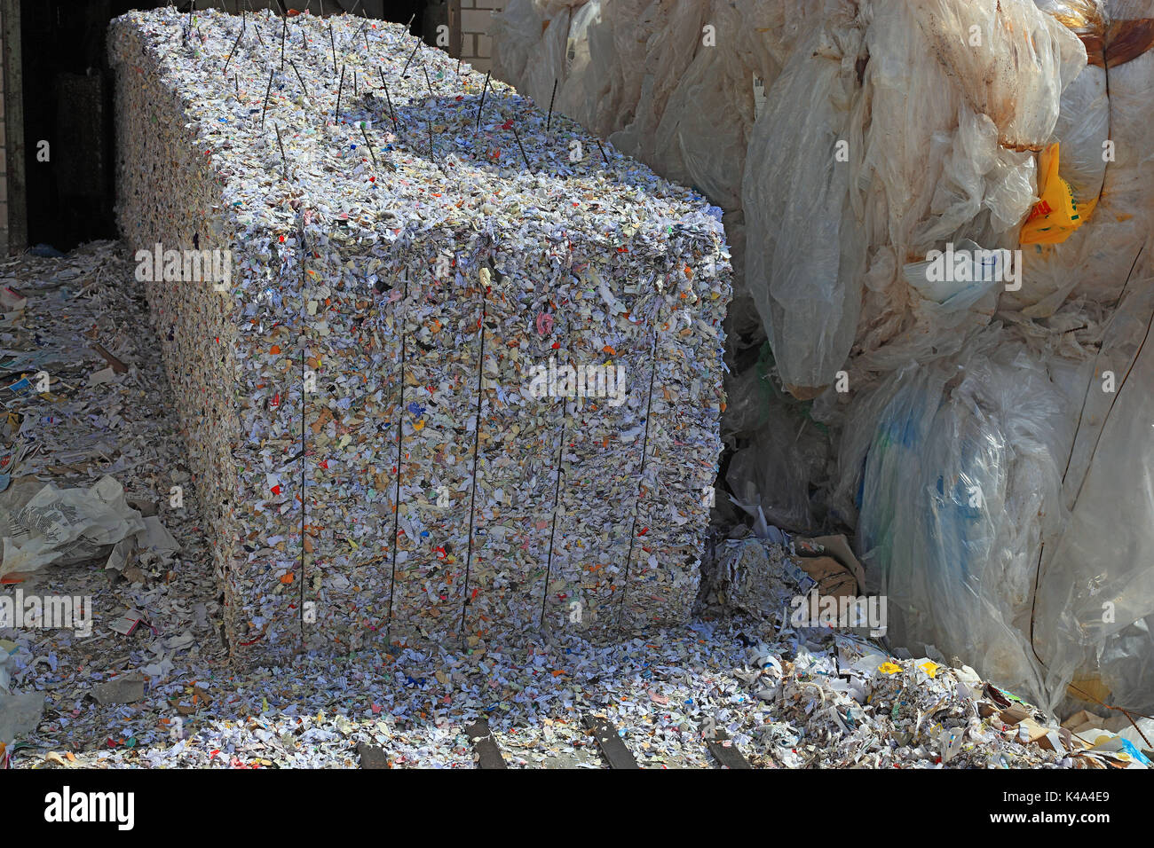 Waste paper, shredded waste paper in a recycling company, paper flakes ...