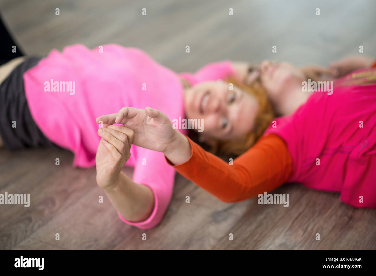 Two women dancing dance contact improvisation Stock Photo - Alamy