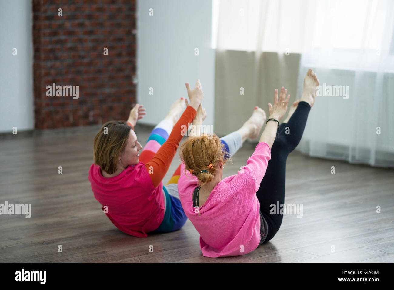 Two women dancing dance contact improvisation Stock Photo - Alamy