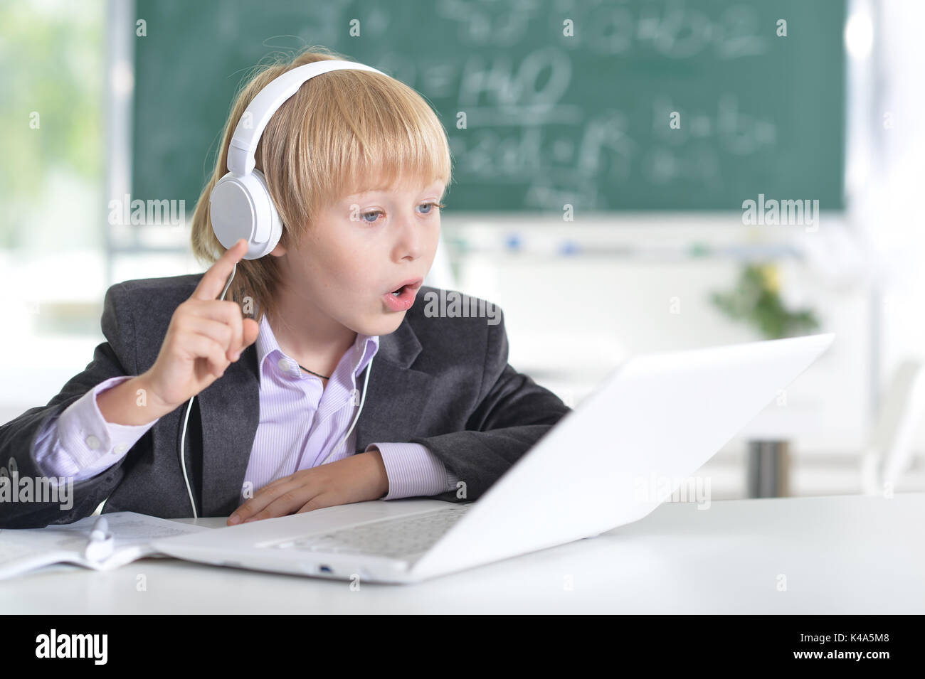 School boy dressed school uniform hi-res stock photography and images ...