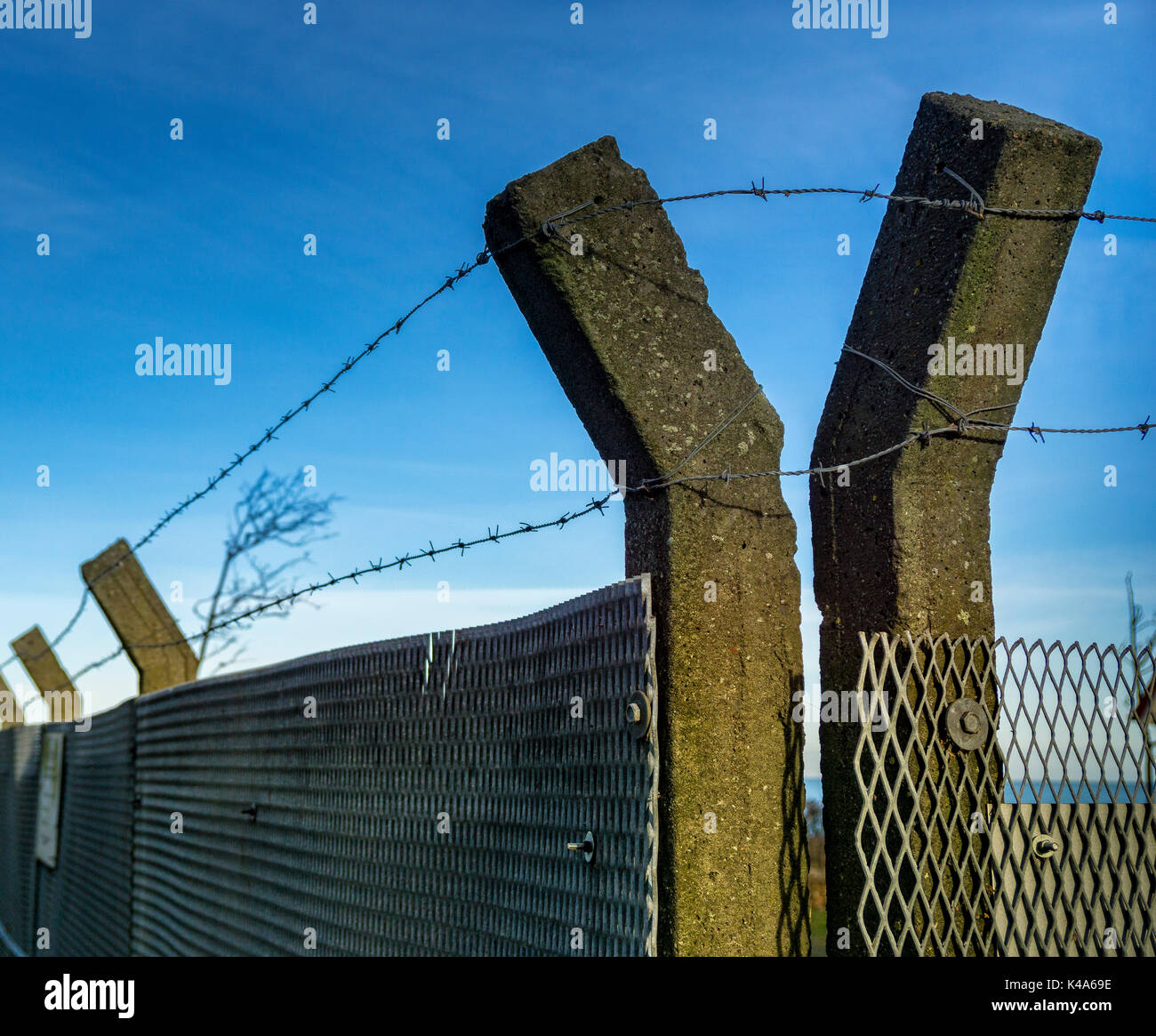 Barbed wire guarding hi-res stock photography and images - Alamy