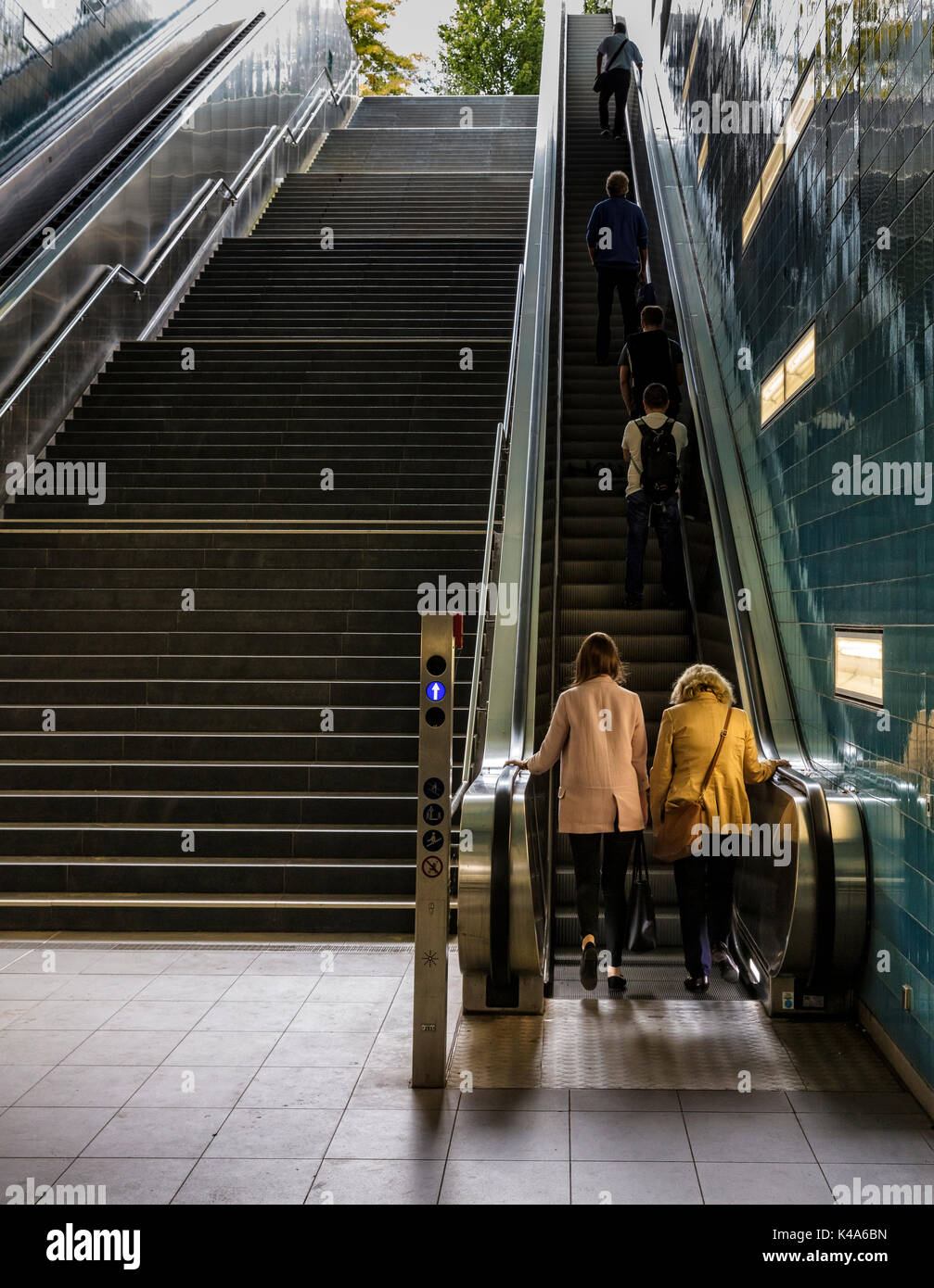 Woman exit elevator hi-res stock photography and images - Alamy