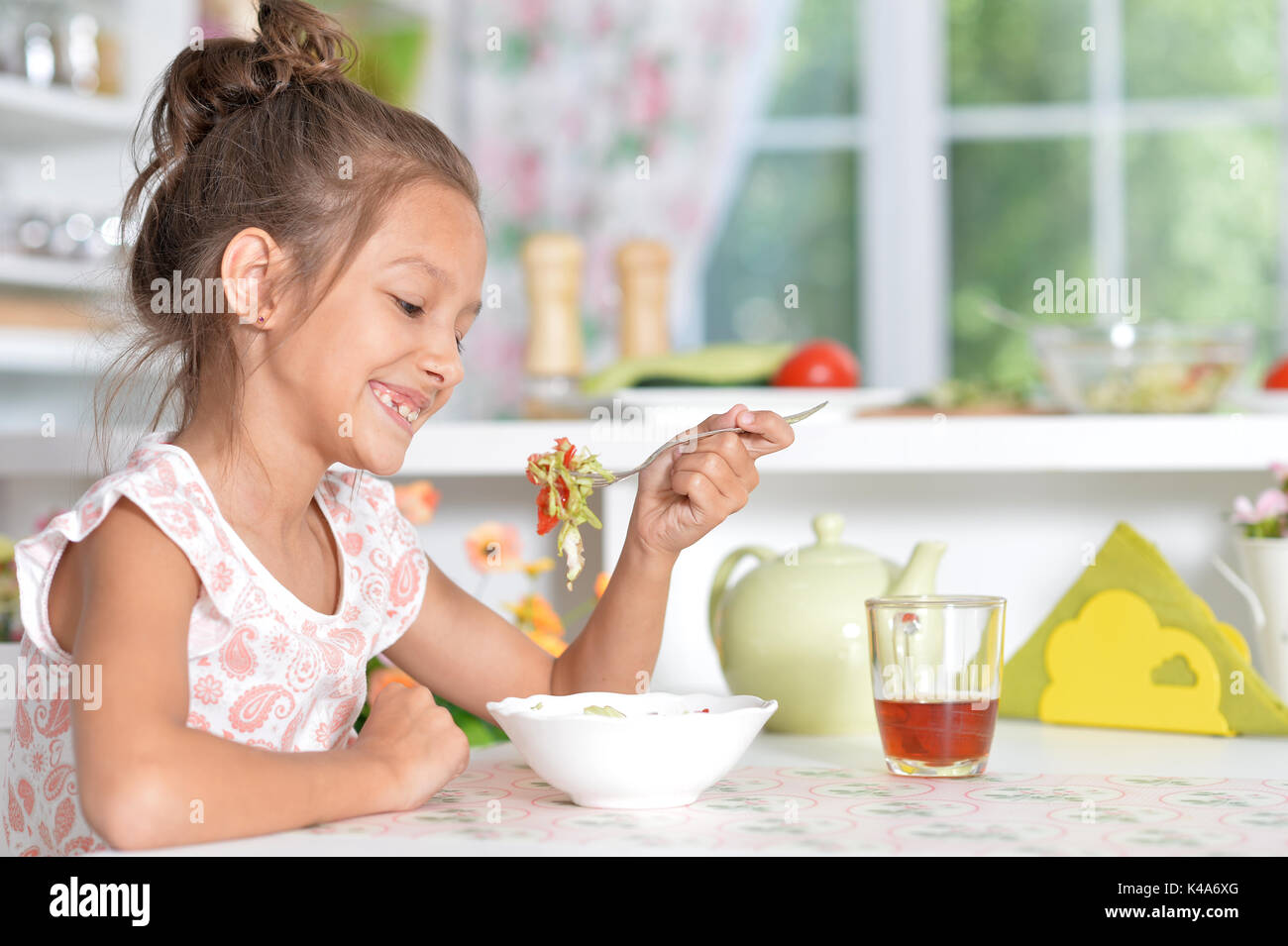 little girl eating soup Stock Photo - Alamy