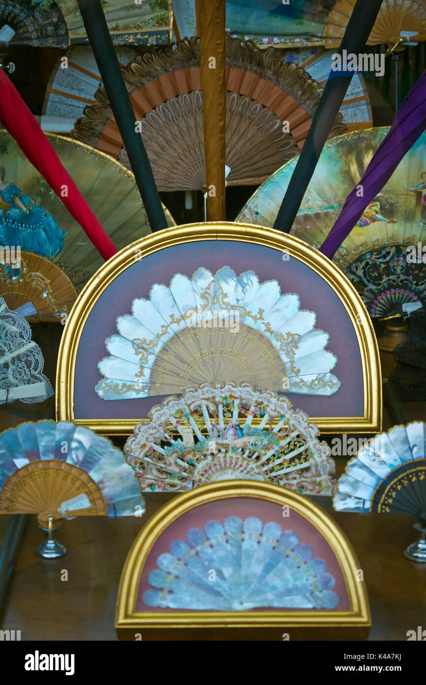 Decorative traditional Spanish fans displayed in a store window in ...