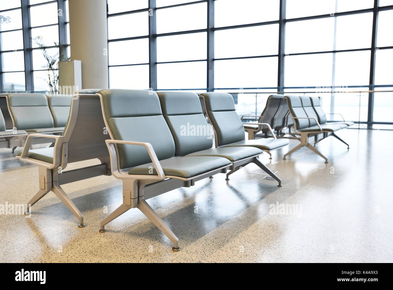 Empty airport terminal waiting area with chairs Stock Photo - Alamy