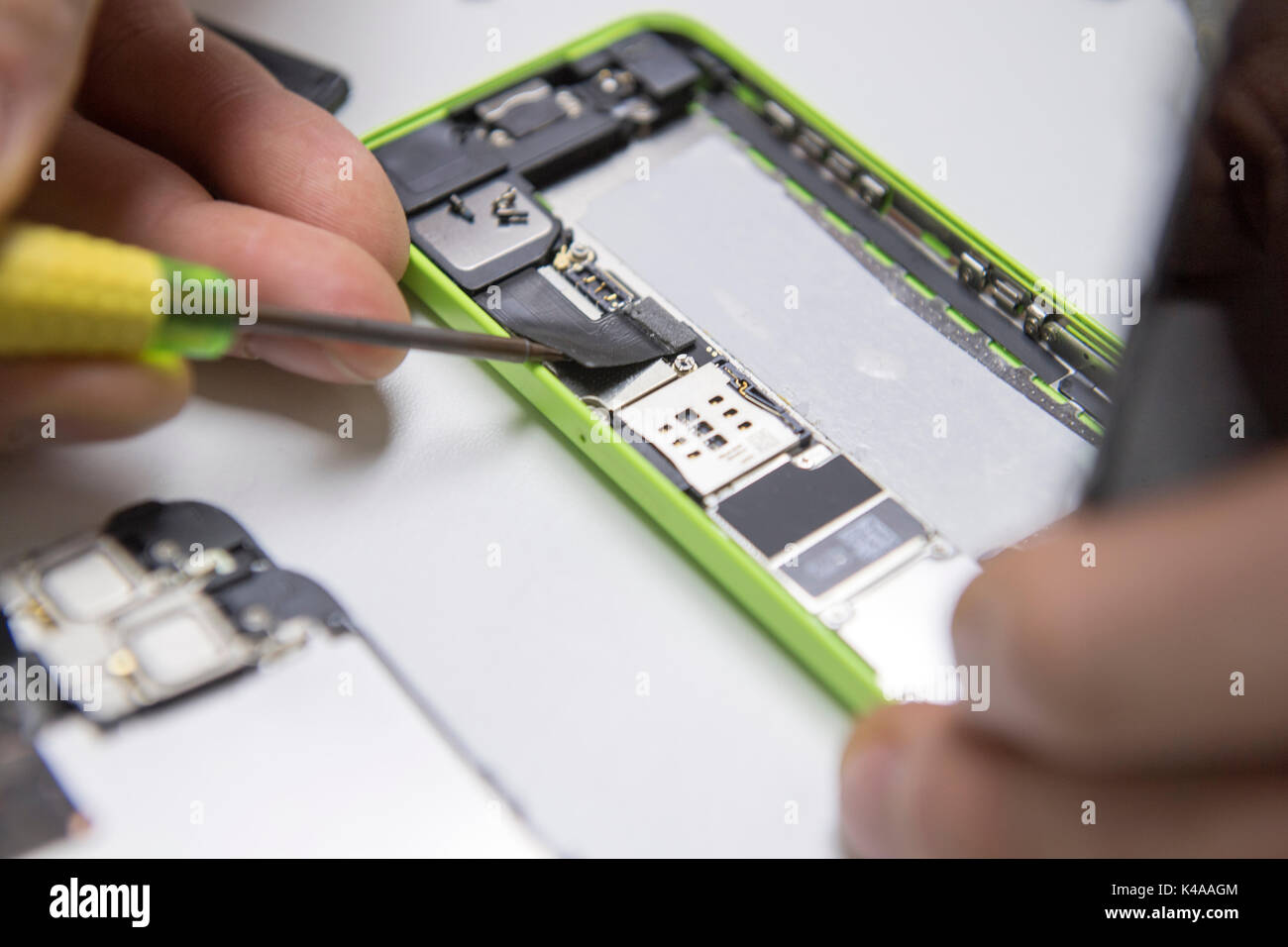 Fixing a telephone hi-res stock photography and images - Alamy