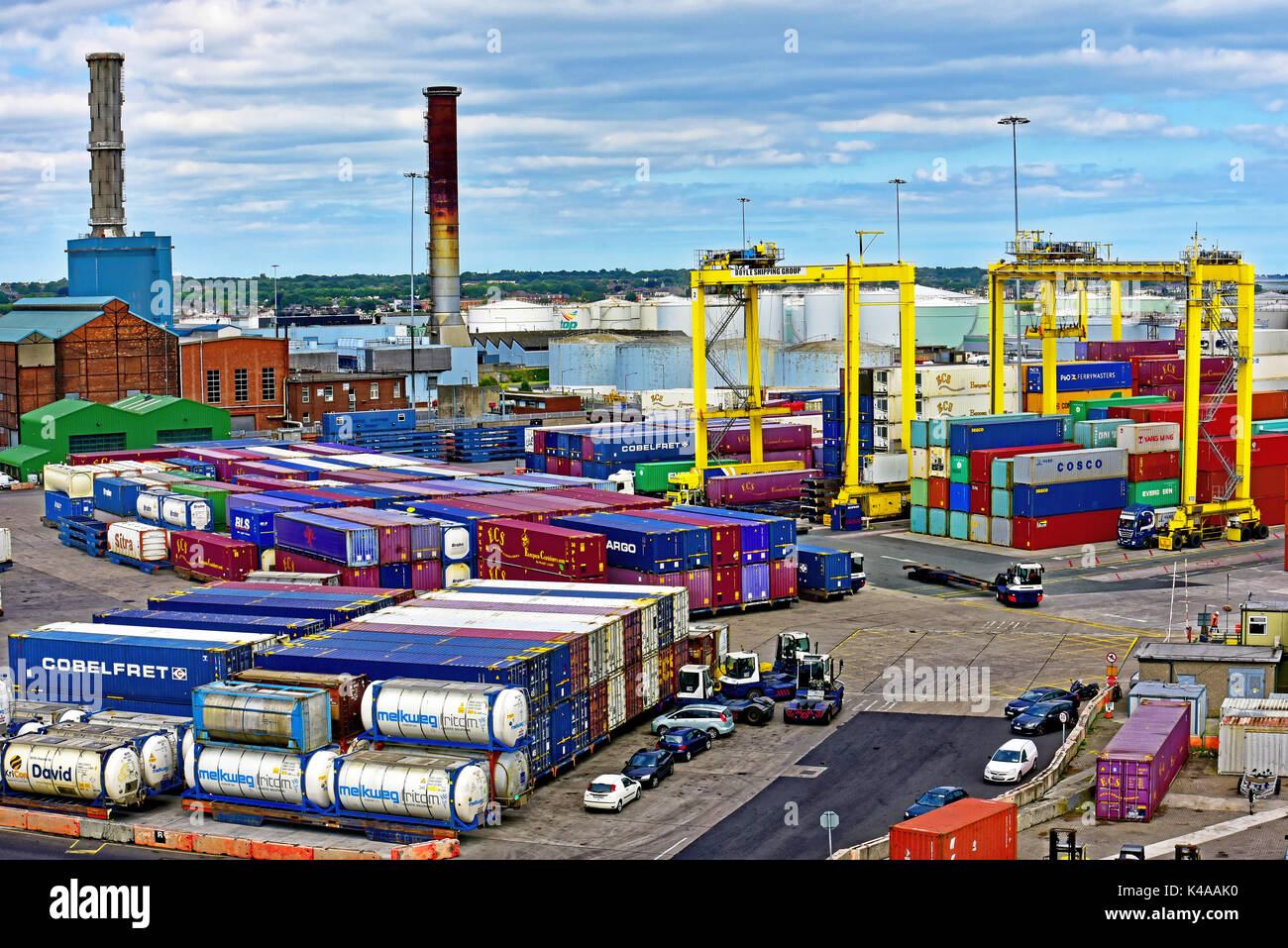 Dublin Ireland Docks harbour area cranes and containers with lorries ...