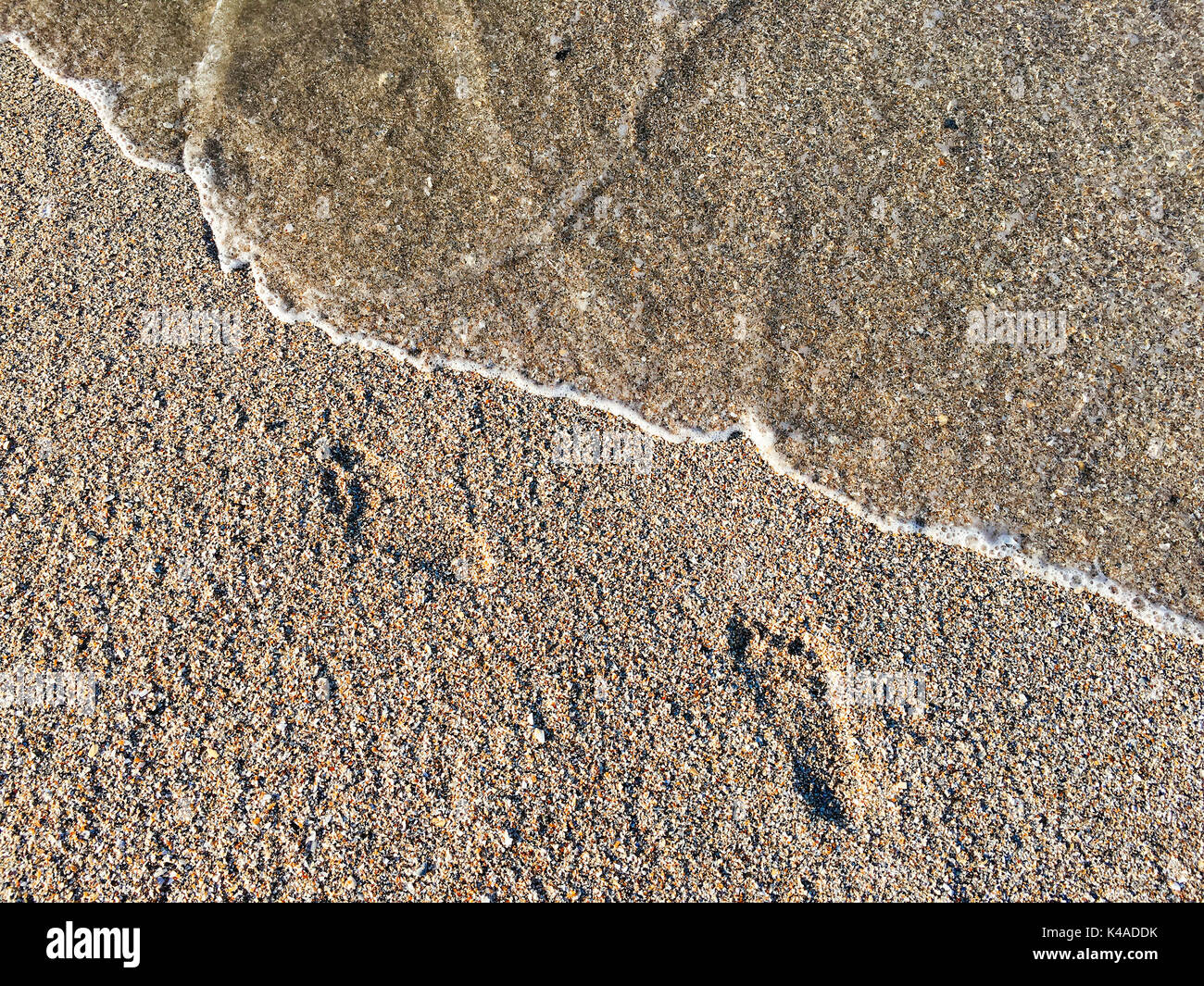 Footprints on seaside sand hi-res stock photography and images - Alamy