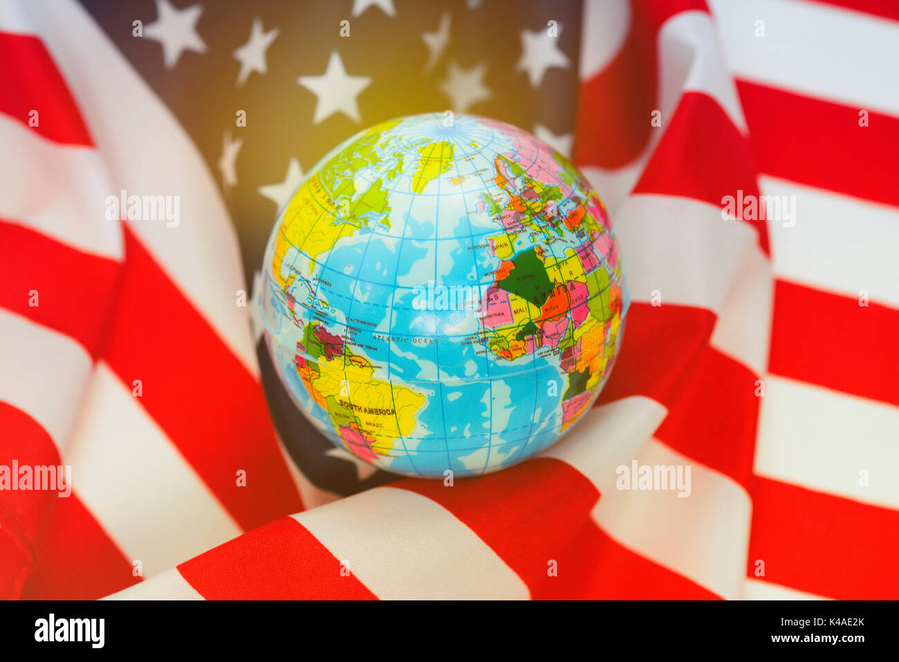 Globe wrapped in us flag hi-res stock photography and images - Alamy