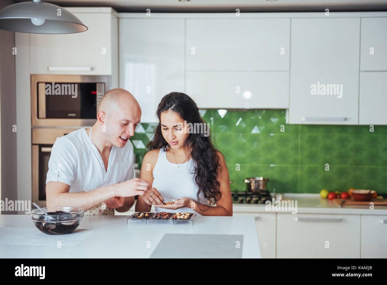 Chocolate preparation - making chocolate in the kitchen Stock Photo - Alamy