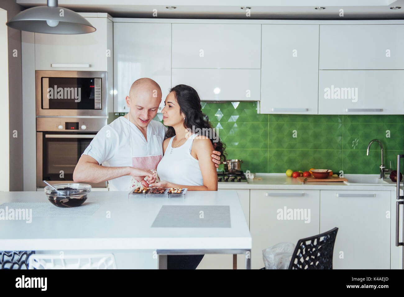 Chocolate preparation - making chocolate in the kitchen Stock Photo - Alamy