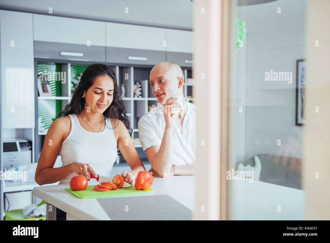 Happy woman dicing food hi-res stock photography and images - Alamy