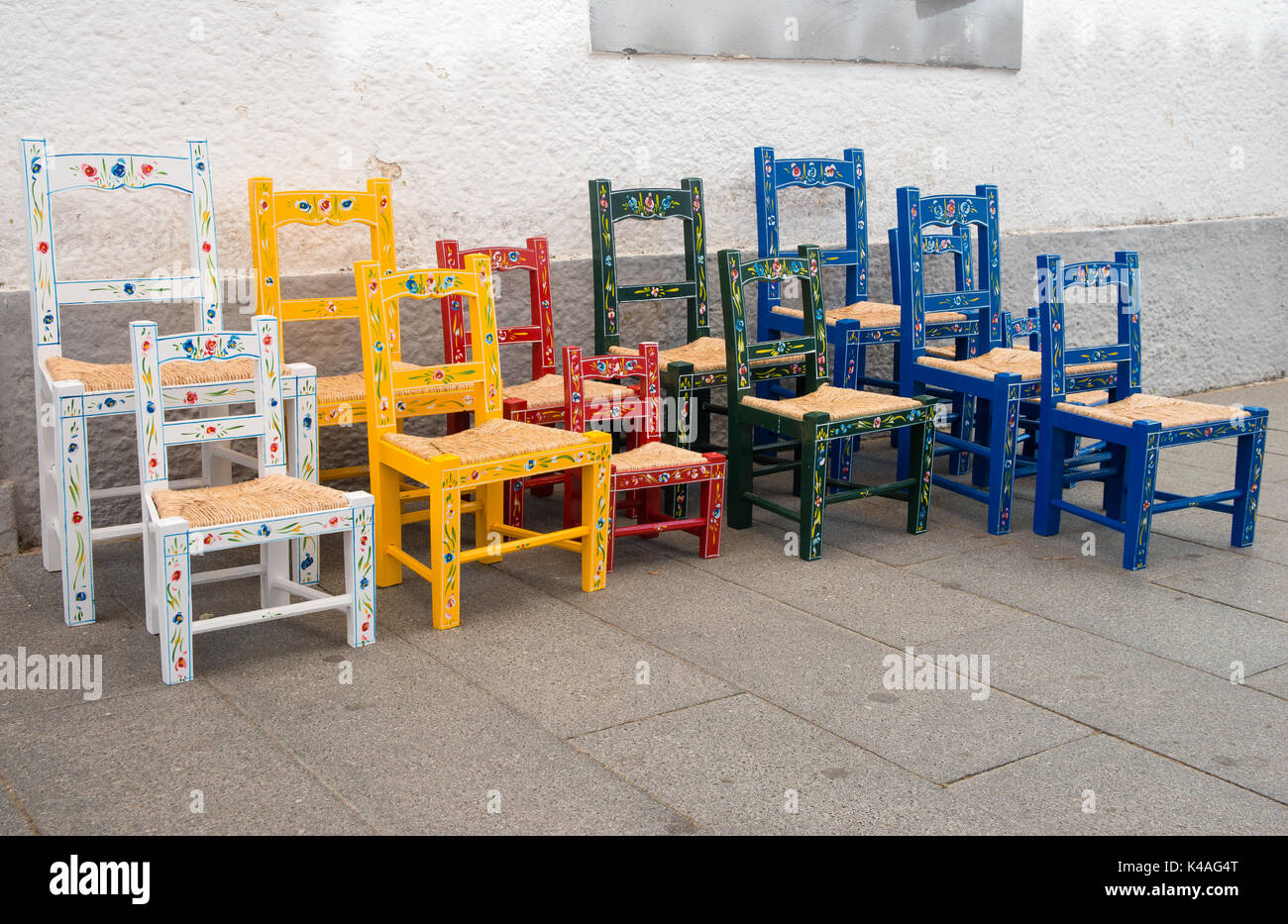 Aged colored ornamental wooden chair Stock Photo - Alamy