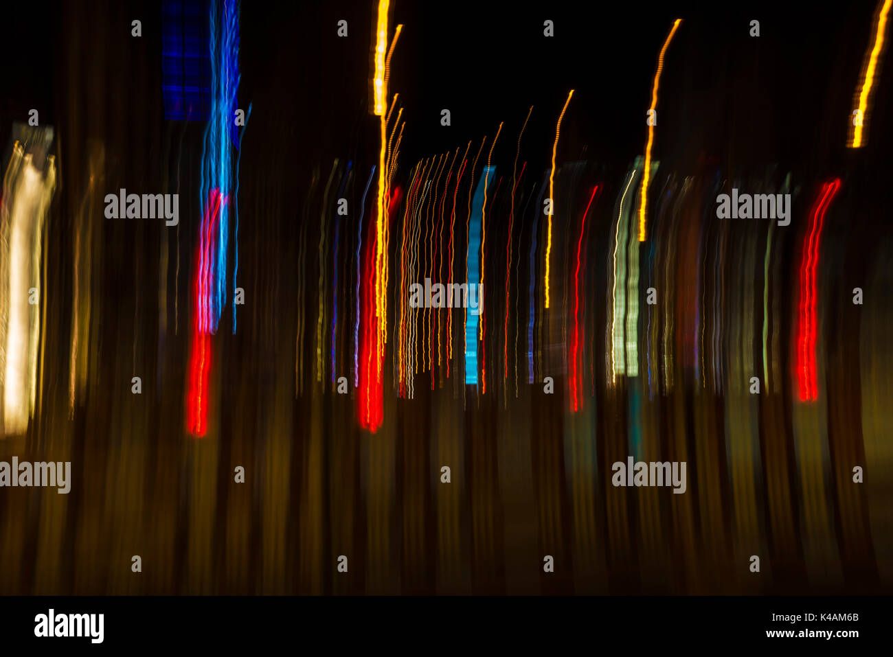 Colored lights in motion at night on street as abstract background ...