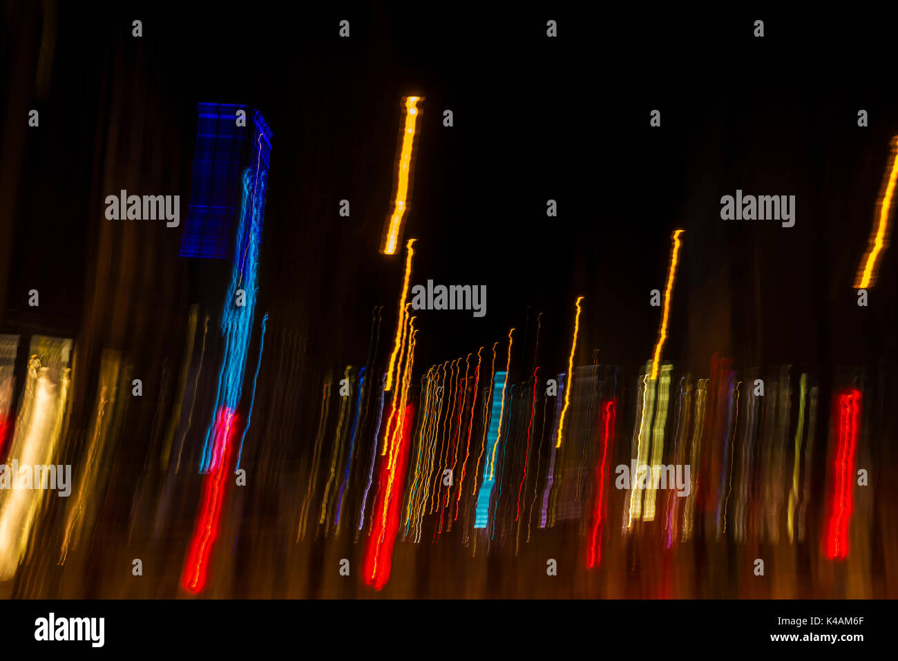 Colored lights in motion at night on street as abstract background ...